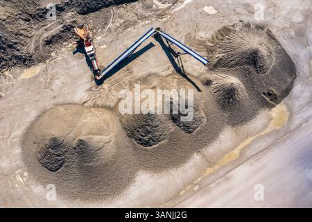 Aerial view of Sunshine Mine with excavators and quarry terrain ...