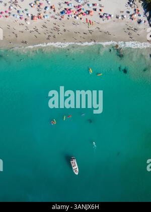 Aerial view of Clifton 4th pristine beach with luxury yachts docked and ...