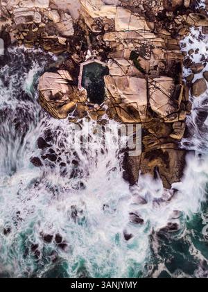 Aerial view of Saunders Rock tidal pool in summer at Bantry Bay ...