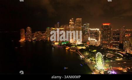Aerial view of illuminated skyline with Skyviews Miami Observation ...