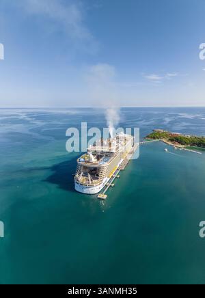 Aerial view of Labadee, Allure of the Seas cruise ship on turquoise ...