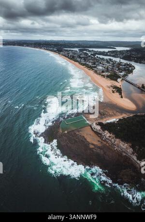 Narrabeen beach ocean pool rockpool on a blue sky autumn day in 2024 ...