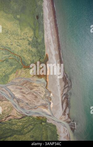 Aerial view of the coastline along Mukushin Bay, Unalaska island ...