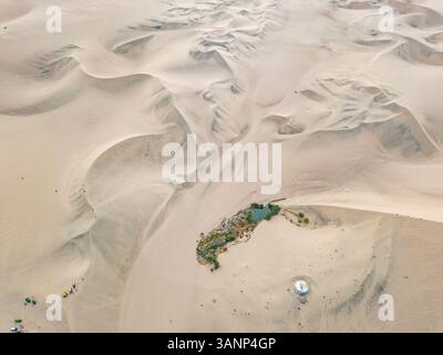 Aerial panoramic view of Huacachina desert oasis and sand dunes, Peru ...