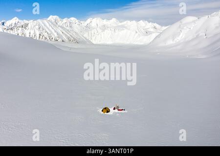 Aerial view of snowy Braldu glacier and Lukpe La Pass, Gojal, Gilgit ...