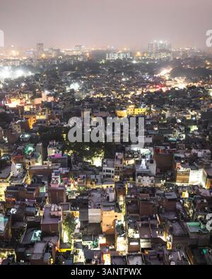 Aerial view of bustling Pahar Ganj with vibrant buildings and greenery ...