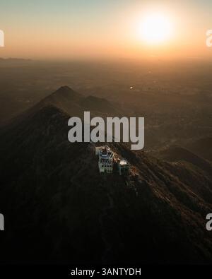 Aerial view of Shree Savitri Mata Temple on a serene mountain during ...