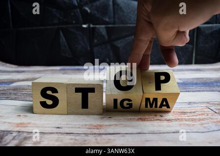 Stigma or shame symbol. Concept words Stigma or Shame on wooden cubes ...