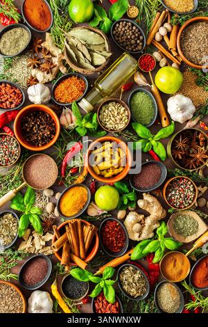 Various fragrant spices and herbs. On a wooden background Stock Photo ...