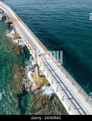Aerial view of Vivara bridge connecting Vivara Island Natural reserve ...