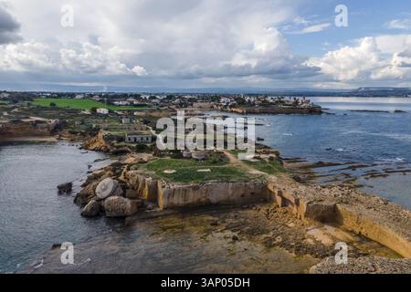 Aerial view of Punta della Mola with Ortigia island on background in ...