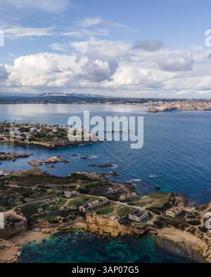 Aerial view of Punta della Mola coastline on Plemmirio Natural Reserve ...