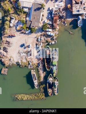 Aerial view of a shipyard along the lagoon in Amora, Setubal, Portugal ...