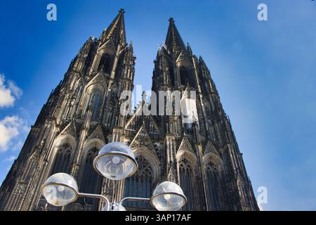 Aerial view of the grand Cologne Cathedral piercing the skyline amidst ...