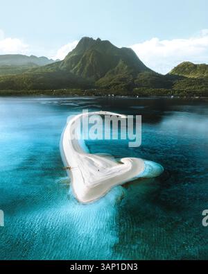 Aerial view of a pristine white sandbar curves gently through turquoise ...