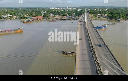 Aerial view of shah amanat bridge over karnafully river with ships and ...