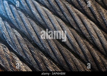 Steel twisted cable wound on a drum, next to each other, close-up Stock ...