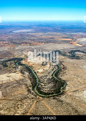 Aerial view of meandering Darling River Anabranch in arid outback with ...