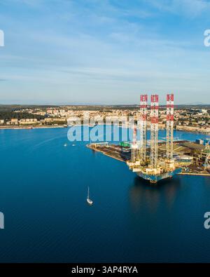 Aerial view of Pula harbour with harbour and shipyard, Pula, Istria ...