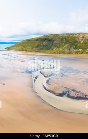 Aerial view of sandbanks in the fjord Kaldalon where water from the ...