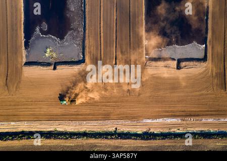 Aerial view of peat bog exploitation for commercial purposes in ...