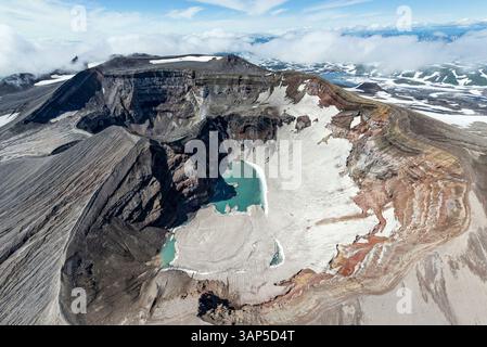 Aerial view of majestic Gorely volcano with rugged terrain and snow ...