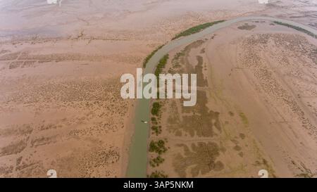 Aerial view of beautiful mangroves and serpentine river in wetlands ...