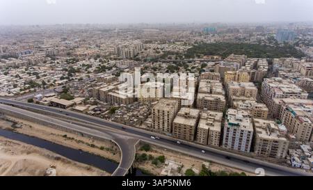Aerial view of lyari expressway with dense urban architecture and ...