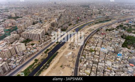 Aerial view of lyari expressway with dense urban architecture and ...