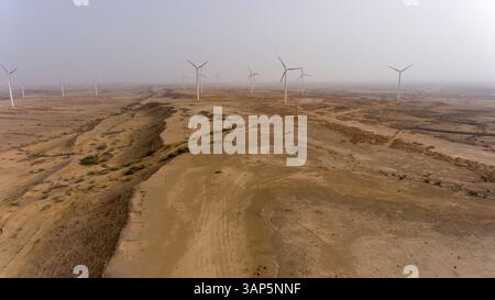 Aerial view of Jhimpir Wind Power Plant surrounded by arid desert ...