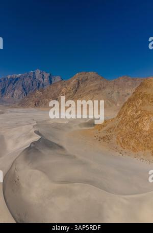 Aerial view of sarfaranga desert with majestic mountains and stunning ...