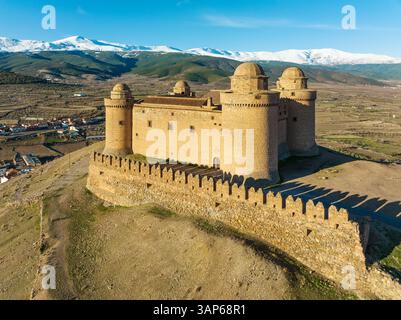 A scenic shot of a hill range covered with green grass on a cloudy day ...