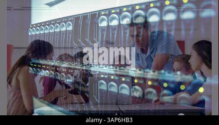 Image of computer server over students and teacher Stock Photo - Alamy