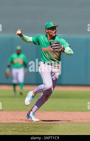 Javier Rivas (5) of the Greensboro Grasshoppers at bat in a South ...