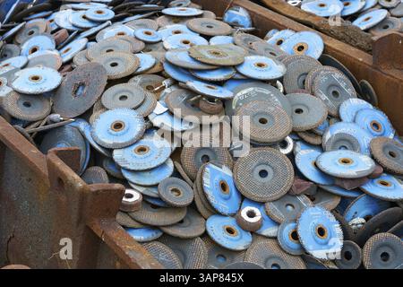 Worn, disused cutting discs for metalworking Stock Photo - Alamy