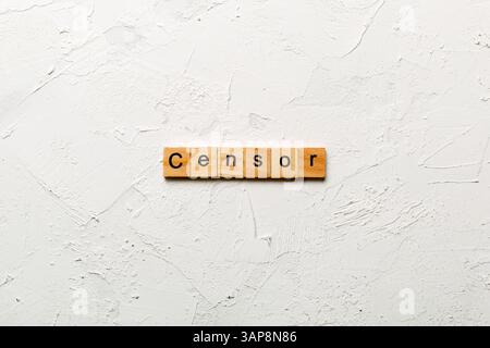 Censor word written on wood block. Censor text on wooden table for your ...