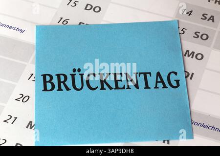 Bridge day symbol image: Note with inserted text BRÜCKENTAG on a ...
