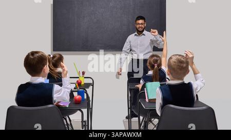 Primary school teacher leading a hands-on science activity with a group ...