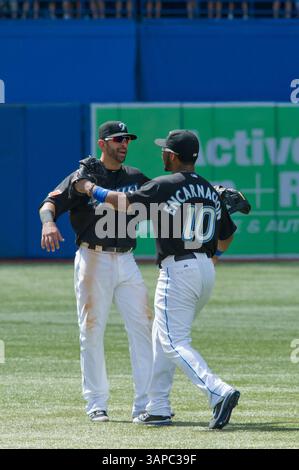 Toronto Blue Jays celebrate an 8-7 win in 10 innings over the Baltimore ...
