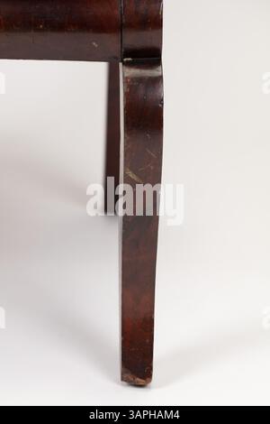 High-backed priest's chair with a red velvet upholstered seat and back ...