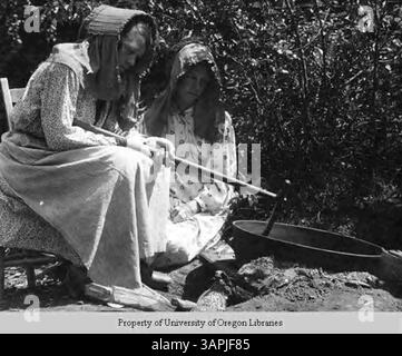 This photograph captures Anner and Ainer Owenby, two women in bonnets ...