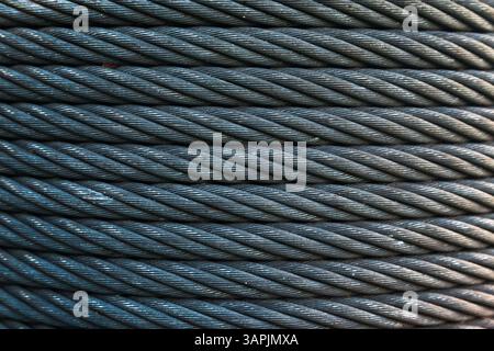 Steel twisted cable wound on a drum, next to each other, close-up Stock ...