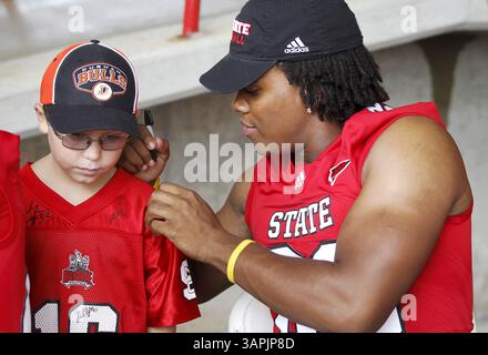 North Carolina State's Anthony Creecy (26) runs drills during spring ...