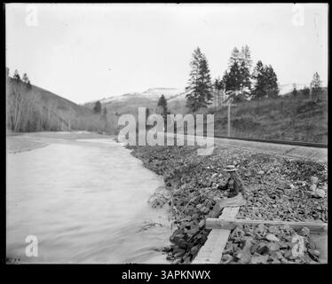 A landscape scene of tranquil Gibbon River at Yellowstone Park with ...