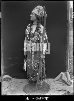 This photograph shows Esther Umahollis, an Umpqua tribal woman, wearing ...