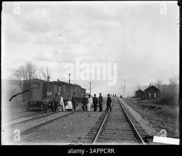 The image shows track maintenance work being carried out by railroad ...