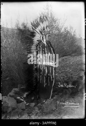 James Reubens, a Nez Perce man, is shown in full costume, including a ...