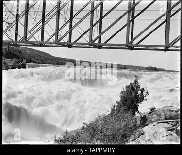 The photograph depicts the Dalles of the Columbia River, including ...