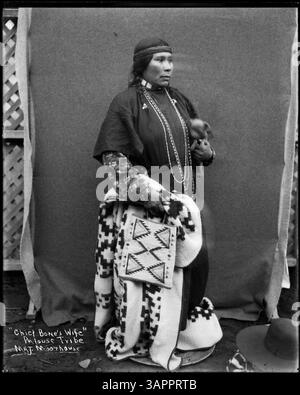 This photograph shows Chief Bones and his wife from the Palouse Tribe ...