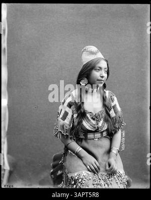 This photograph shows Anna Kash Kash, a Cayuse tribal woman, in regalia ...